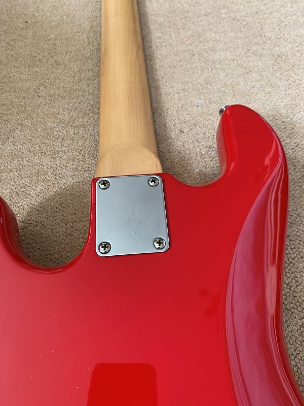 Encore P Bass in Red with white scratch plate - Rock Stock Stores