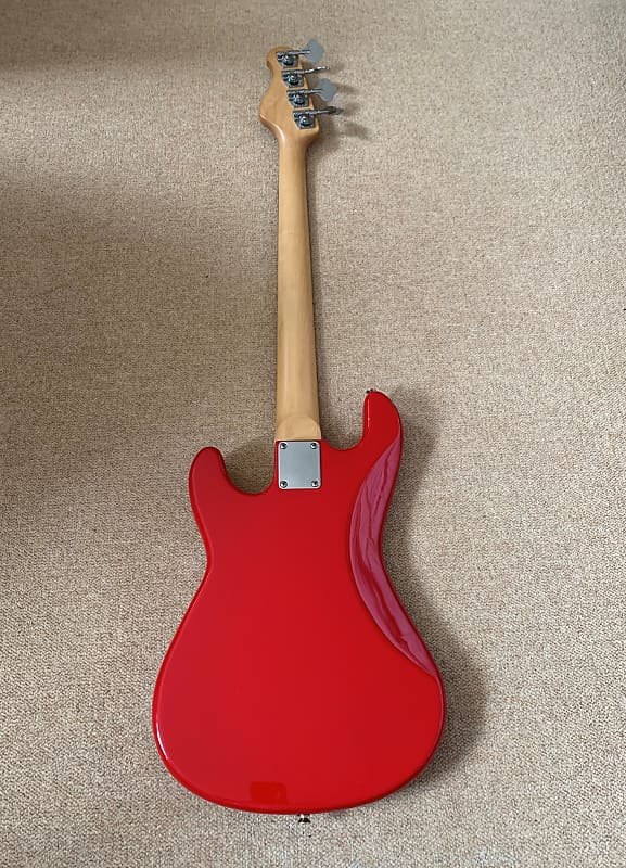 Encore P Bass in Red with white scratch plate - Rock Stock Stores