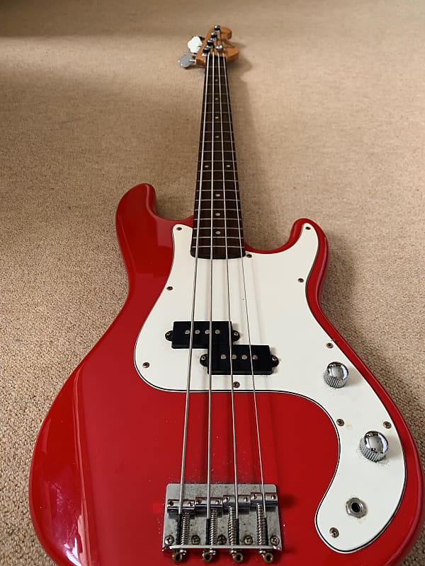 Encore P Bass in Red with white scratch plate - Rock Stock Stores